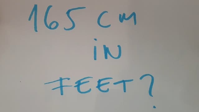 How tall is 165cm in feet and inches?